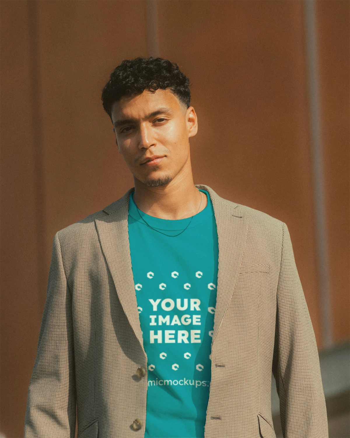 Man Wearing Teal T-shirt Mockup Front View Template